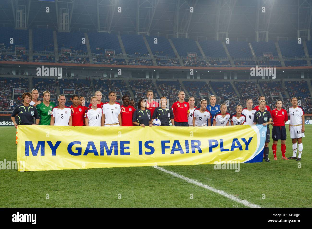 United States and England players gather for a photo op with a Fair ...