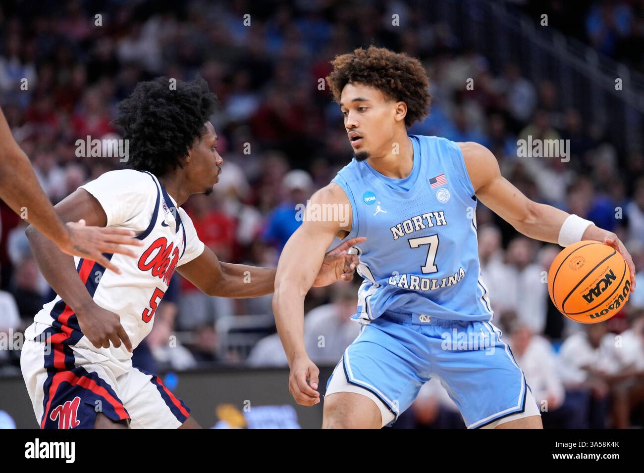North Carolina guard Seth Trimble (7) handles the ball against ...