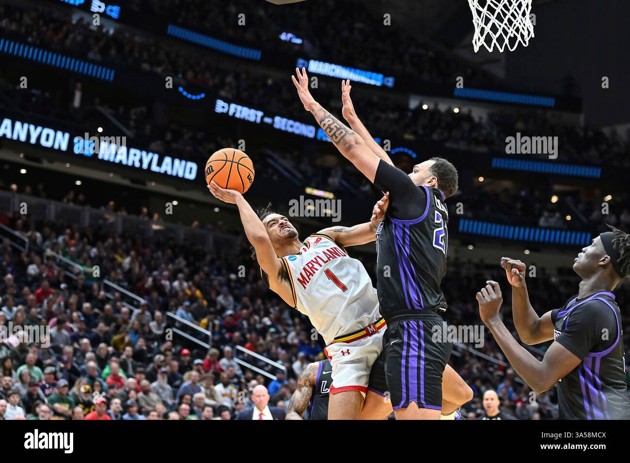 March 21, 2025: Maryland Terrapins guard Rodney Rice (1) extends to ...