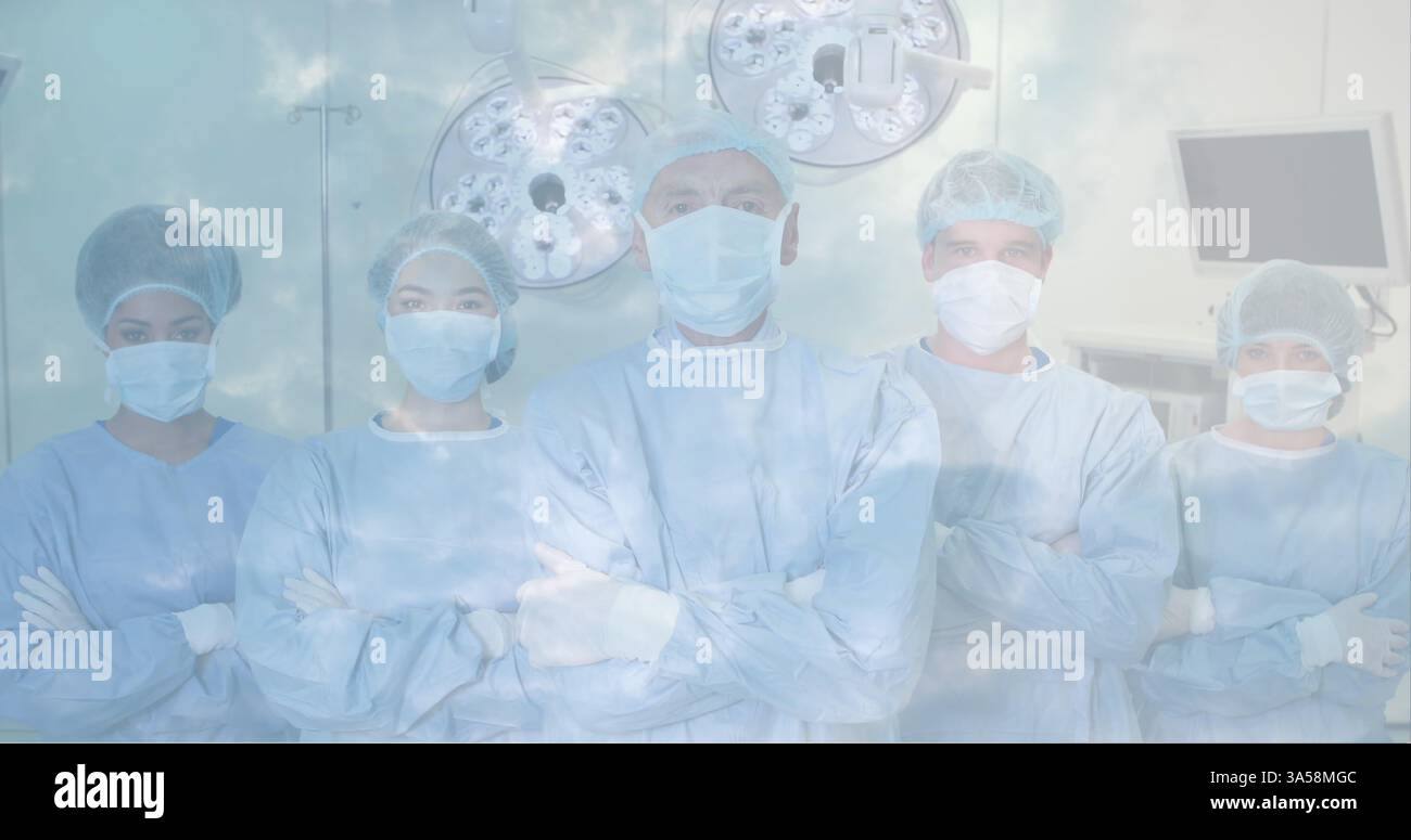 Medical team in surgical scrubs standing confidently in operating room ...