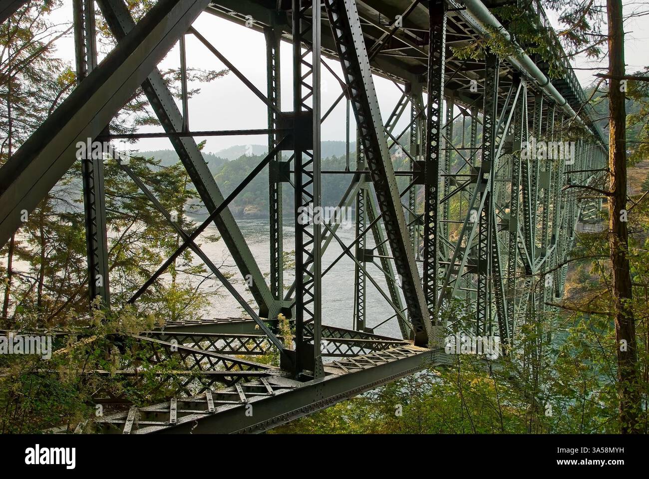 View through truss work of Deception Pass bridge between Whidbey and ...