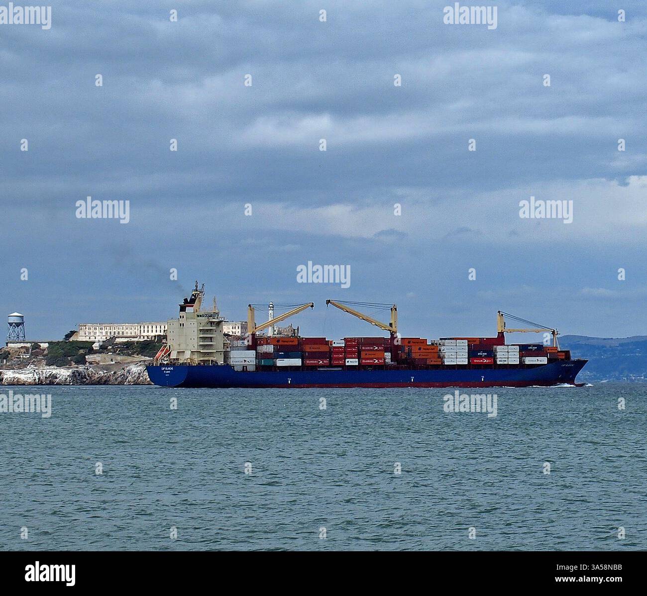 container ship sails past Alcatraz Island in San Francisco Bay ...