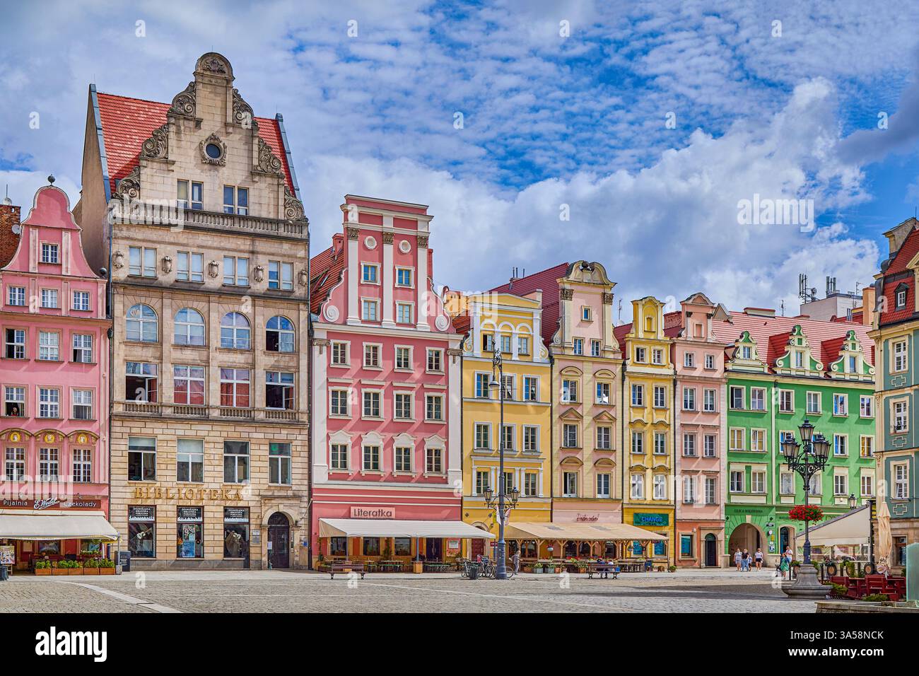 Multi coloured buildings in the Market Square which is a medieval ...