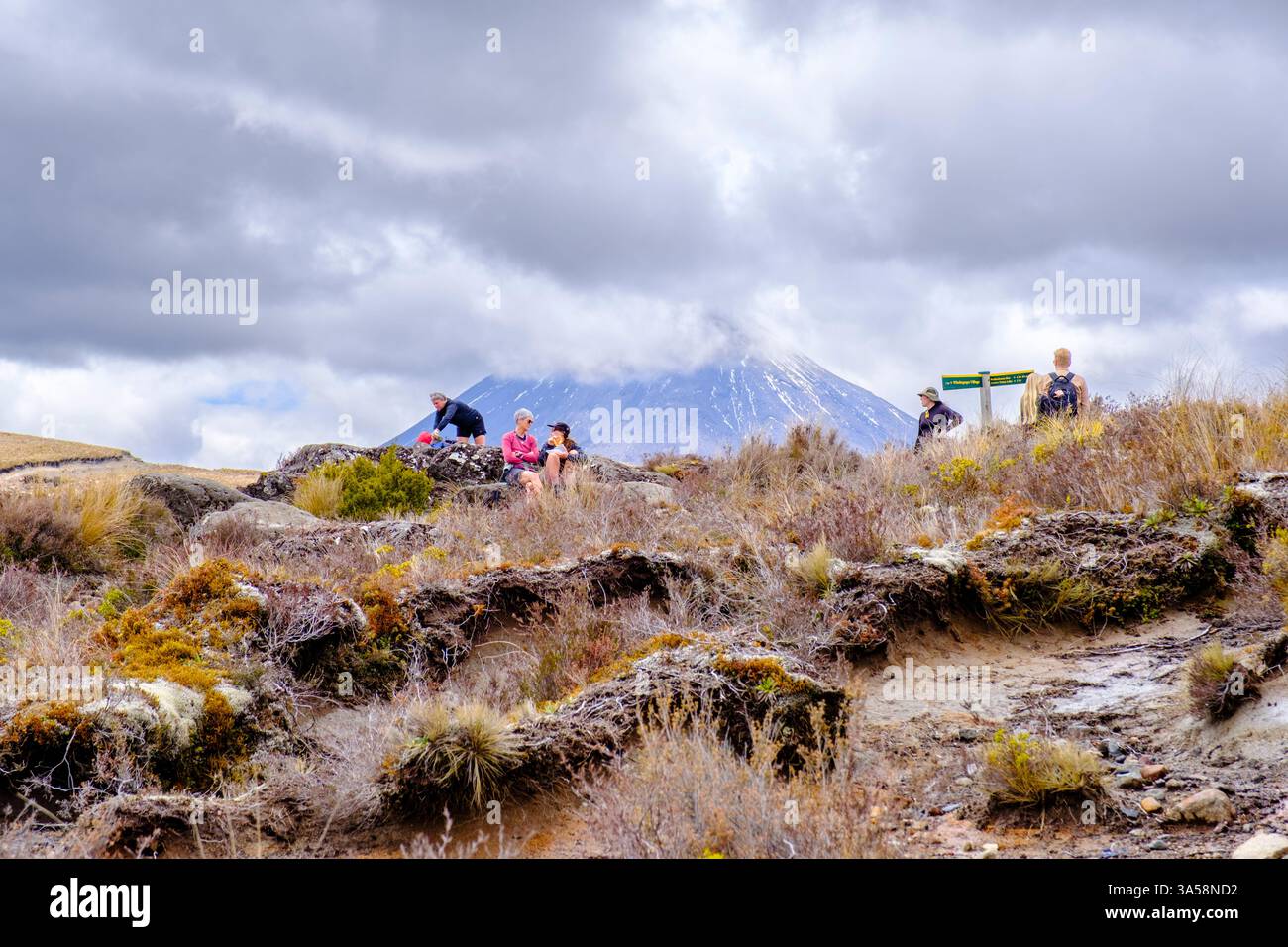 Hikers at Taranaki Falls Track, Tama Lakes Track and Tongariro Northern ...