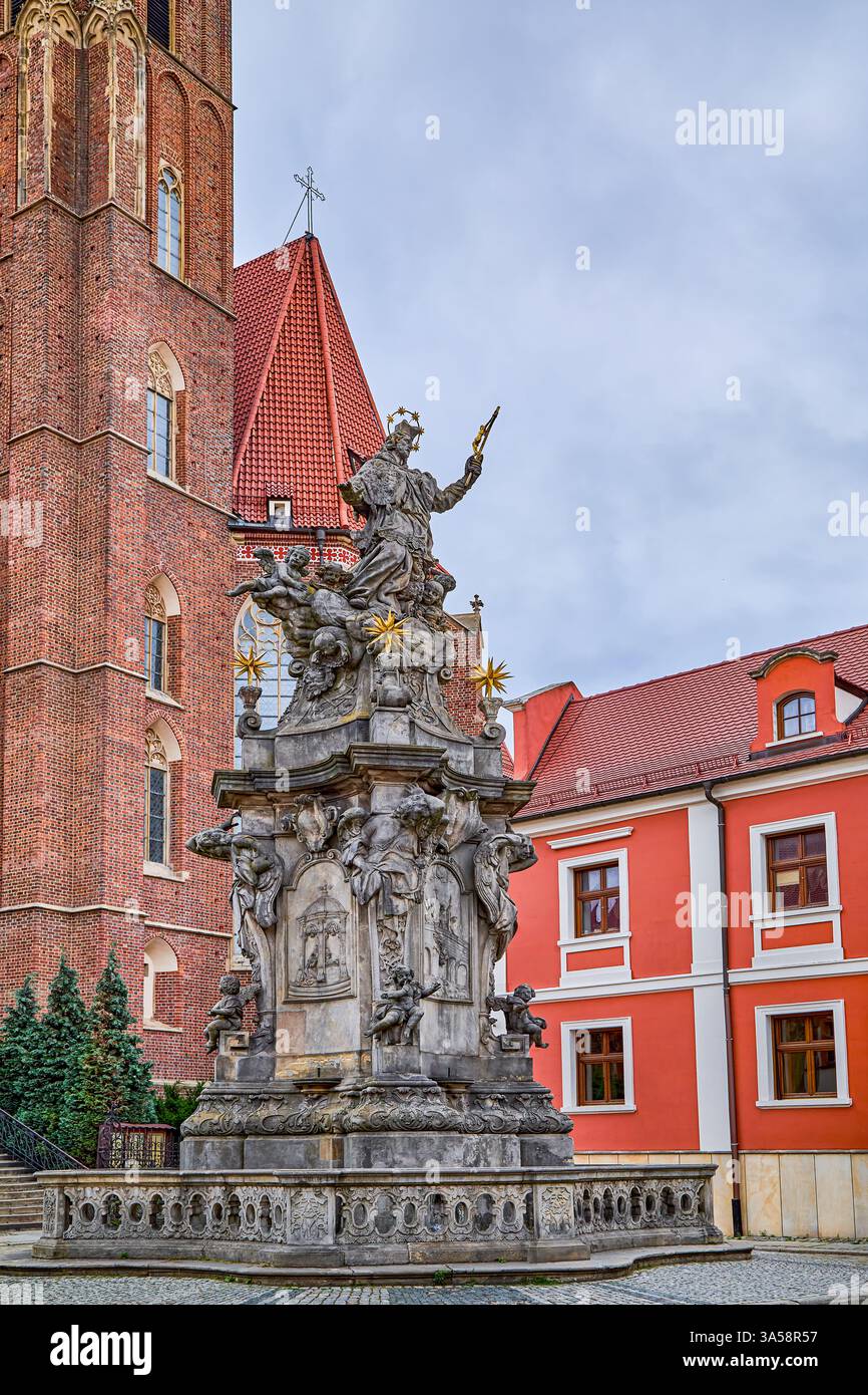 Statue of St. John Nepomuk created in 1732 opposite the Collegiate ...