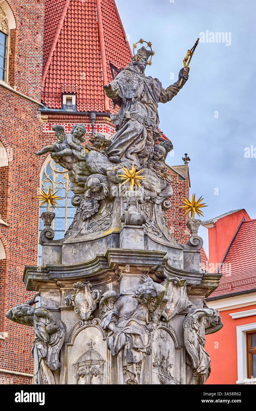 Statue of St. John Nepomuk created in 1732 opposite the Collegiate ...