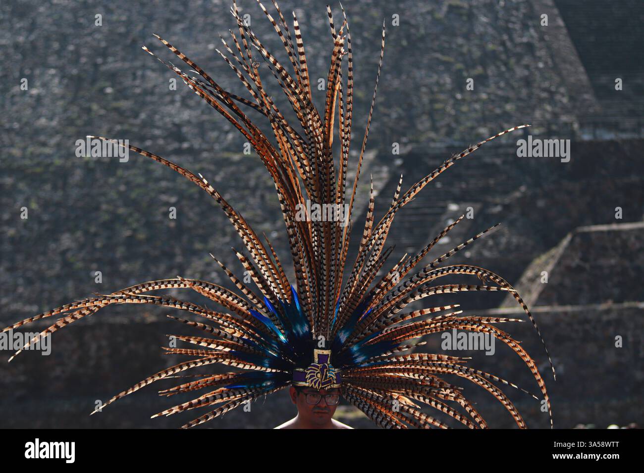 A man of a indigenous community takes part during a ritual in front of ...