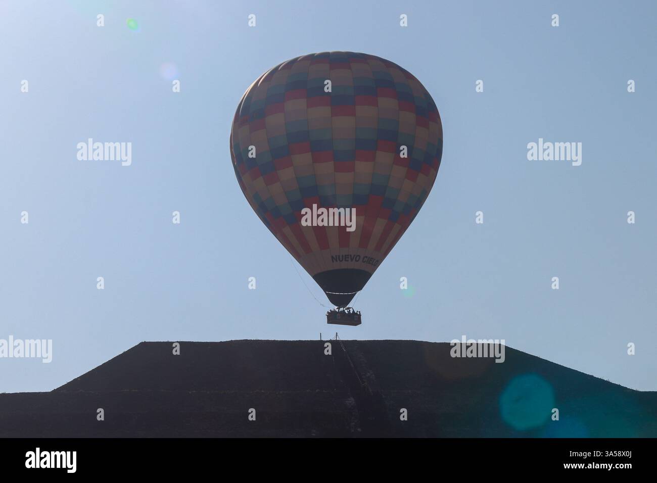 Balloons fly over the Pyramid of the Sun during the welcoming of spring ...