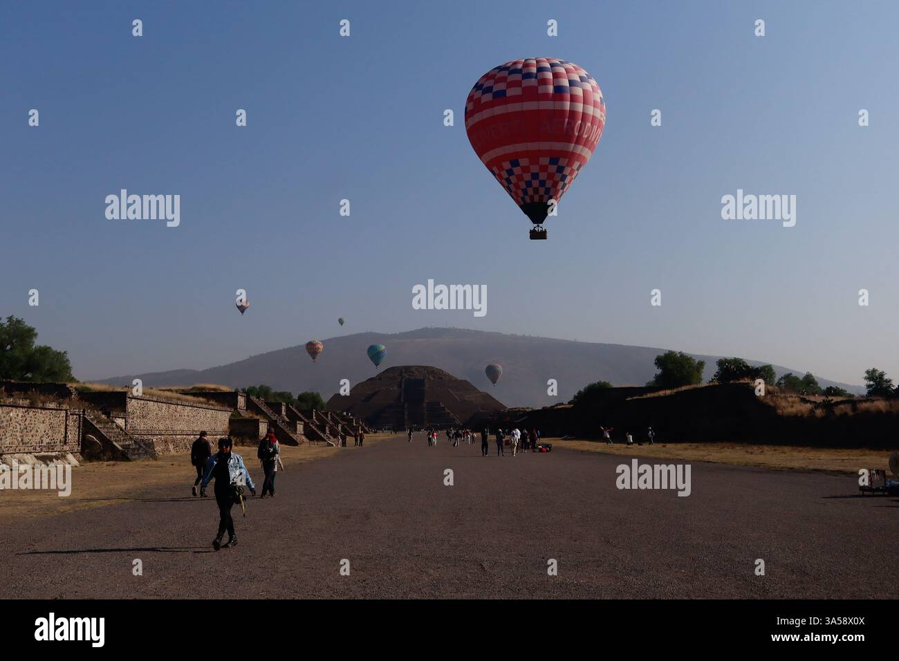 Balloons fly over the Pyramid of the Sun during the welcoming of spring ...