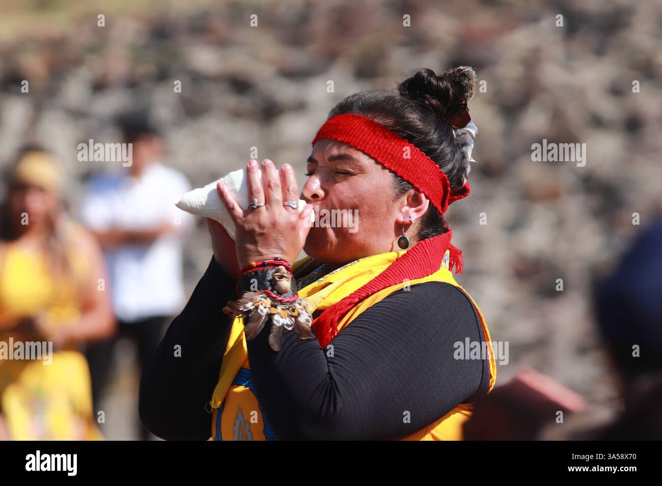 A woman of a indigenous community takes part during a ritual in front ...