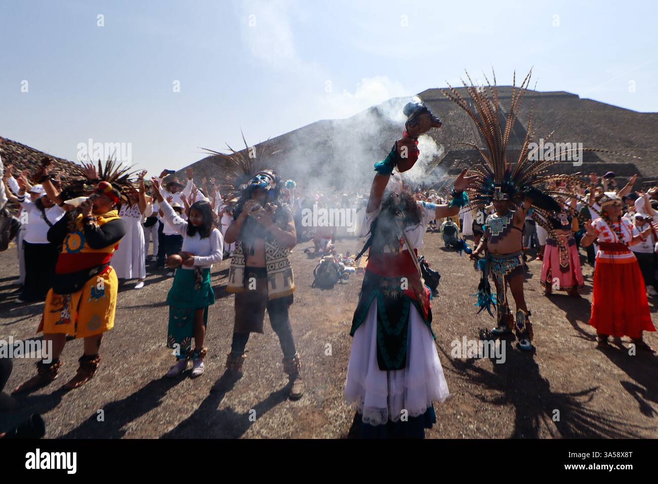 Members of indigenous communities take part during a ritual in front of ...