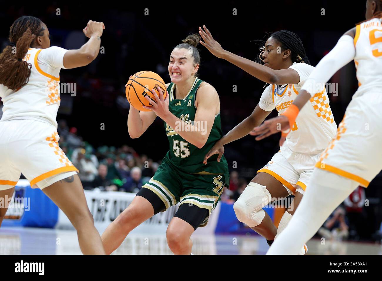 South Florida guard Carla Brito (55) dribbles around the defense of ...