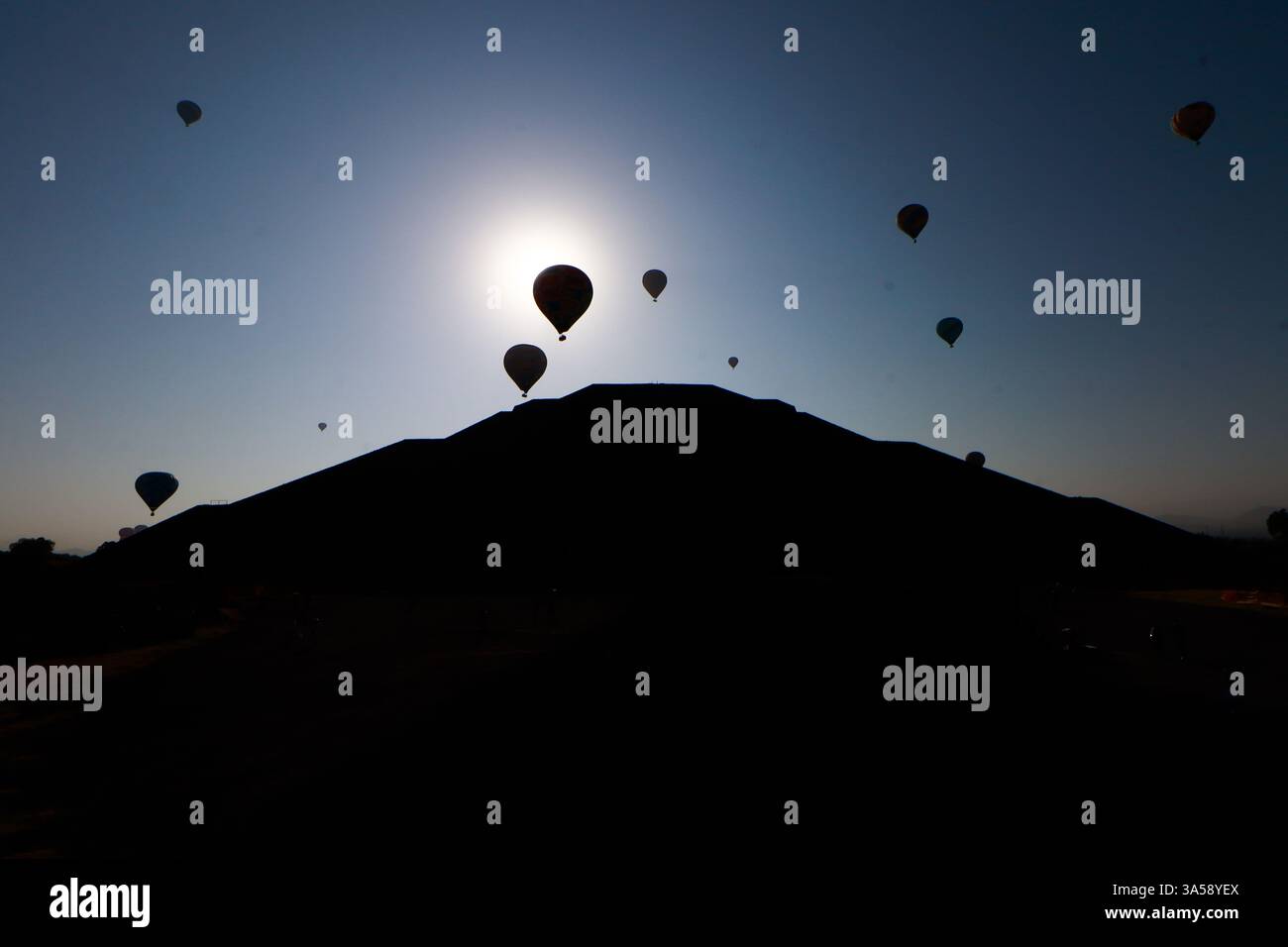 Balloons fly over the Pyramid of the Sun during the welcoming of spring ...
