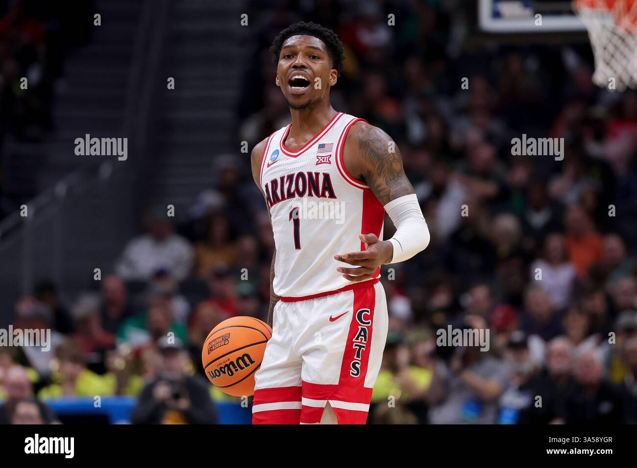 Arizona guard Caleb Love reacts during the second half against Akron in ...