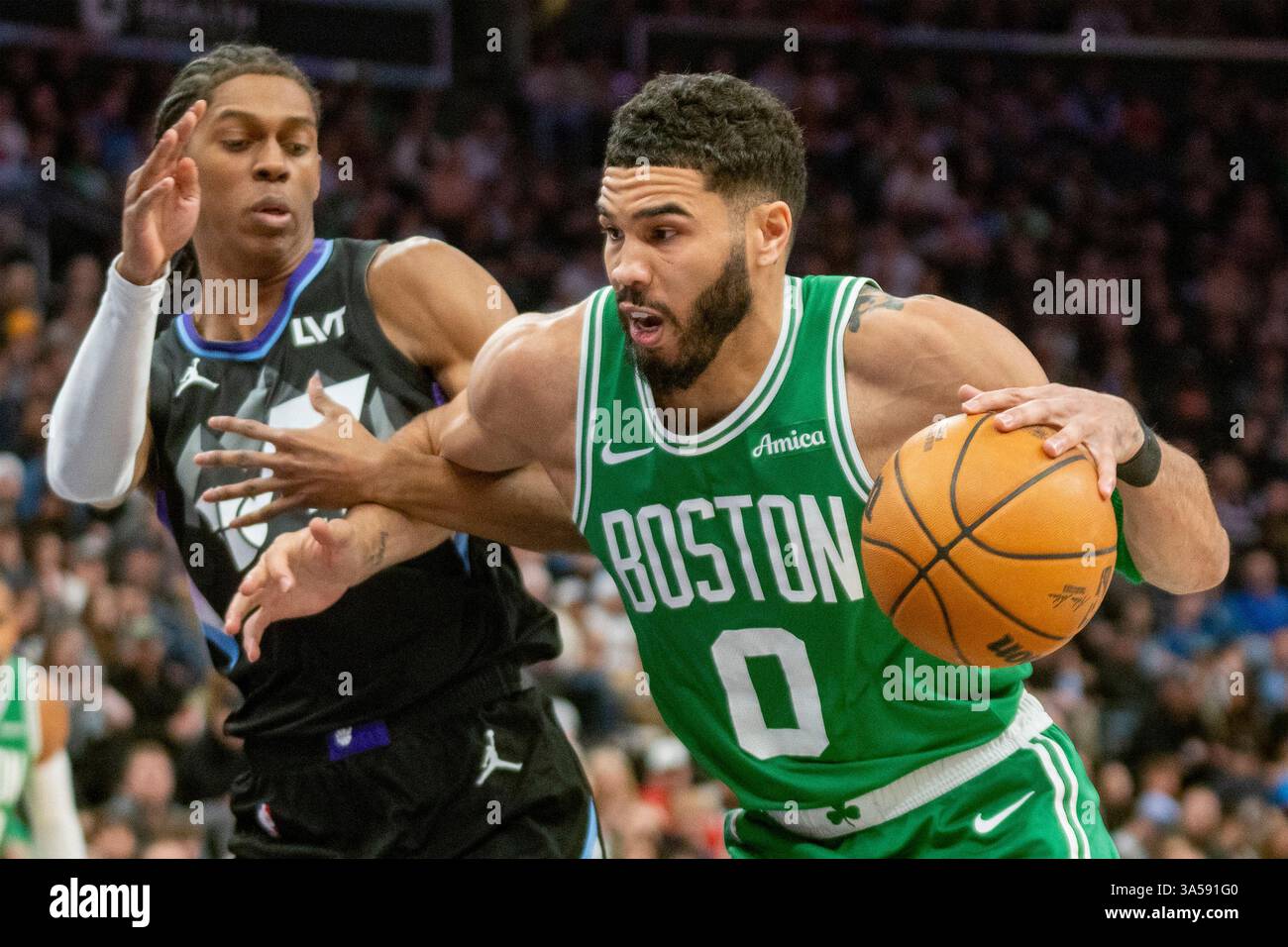 Boston Celtics forward Jayson Tatum (0) breaks for the basket. as Utah ...