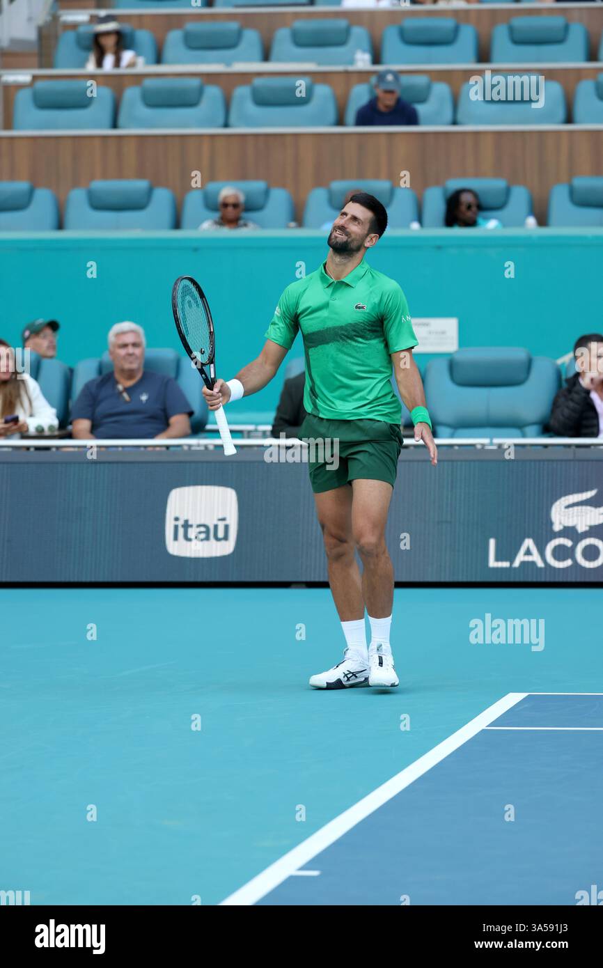 MIAMI GARDENS, FLORIDA - MARCH 21: Novak Djokovic of Serbia defeats Rinky Hijikata of Australia ...