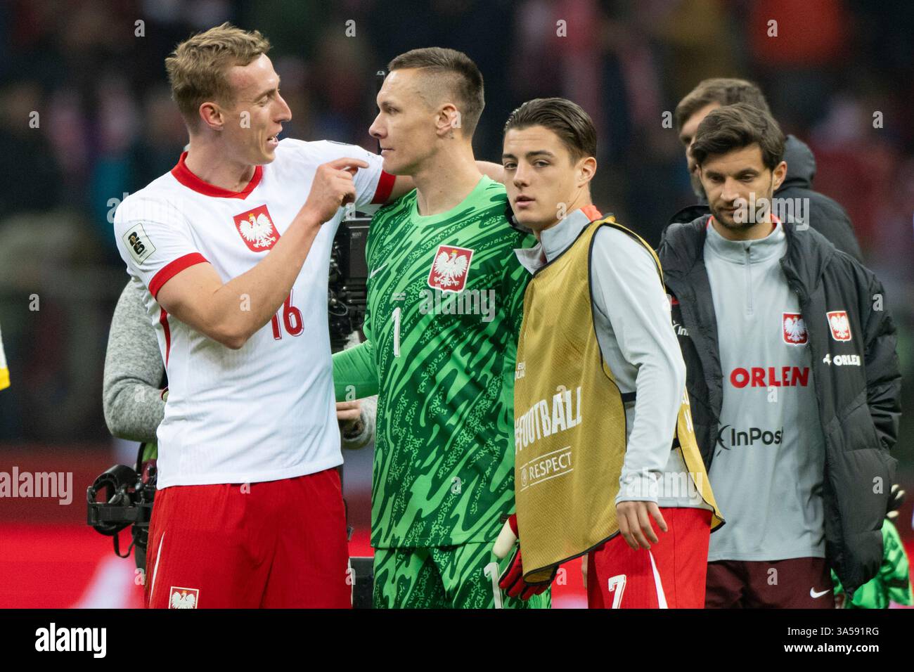 Warsaw, Poland. 21st Mar, 2025. Adam Buksa of Poland, Lukasz Skorupski of Poland and Bartosz ...