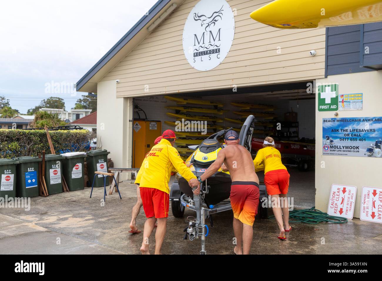 Mollymook surf life saving club, volunteer surf rescue staff push the ...