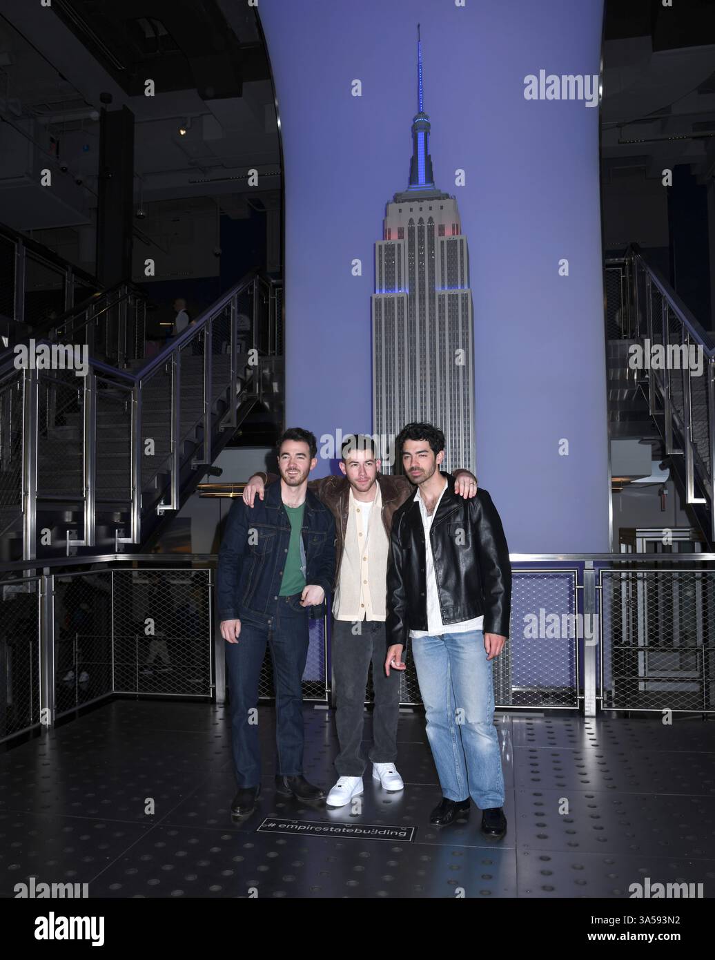March 21, 2025, New York, New York, United States: Kevin Jonas, Nick ...