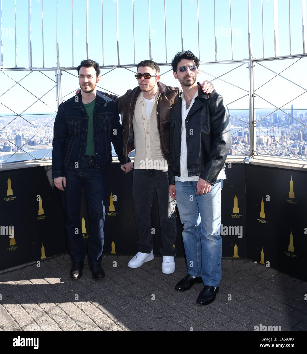 March 21, 2025, New York, New York, United States: Kevin Jonas, Nick ...