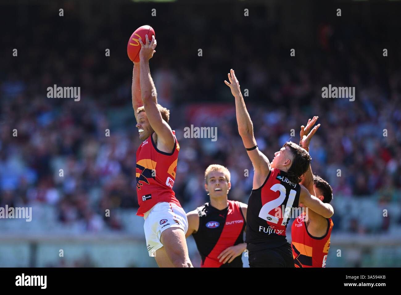 Melbourne, Australia. 22nd Mar, 2025. Mitch Hinge of the Crows (left ...