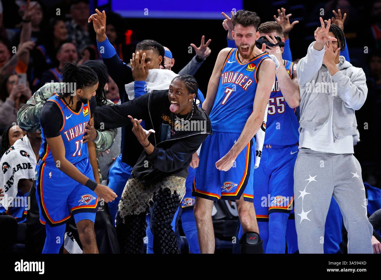 The Oklahoma City Thunder bench reacts after Thunder guard Isaiah Joe ...