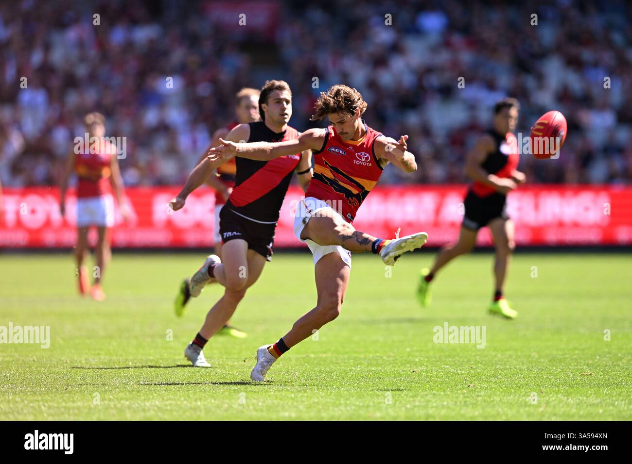 James Peatling of the Crows kicks the footy during the AFL Round 2 ...