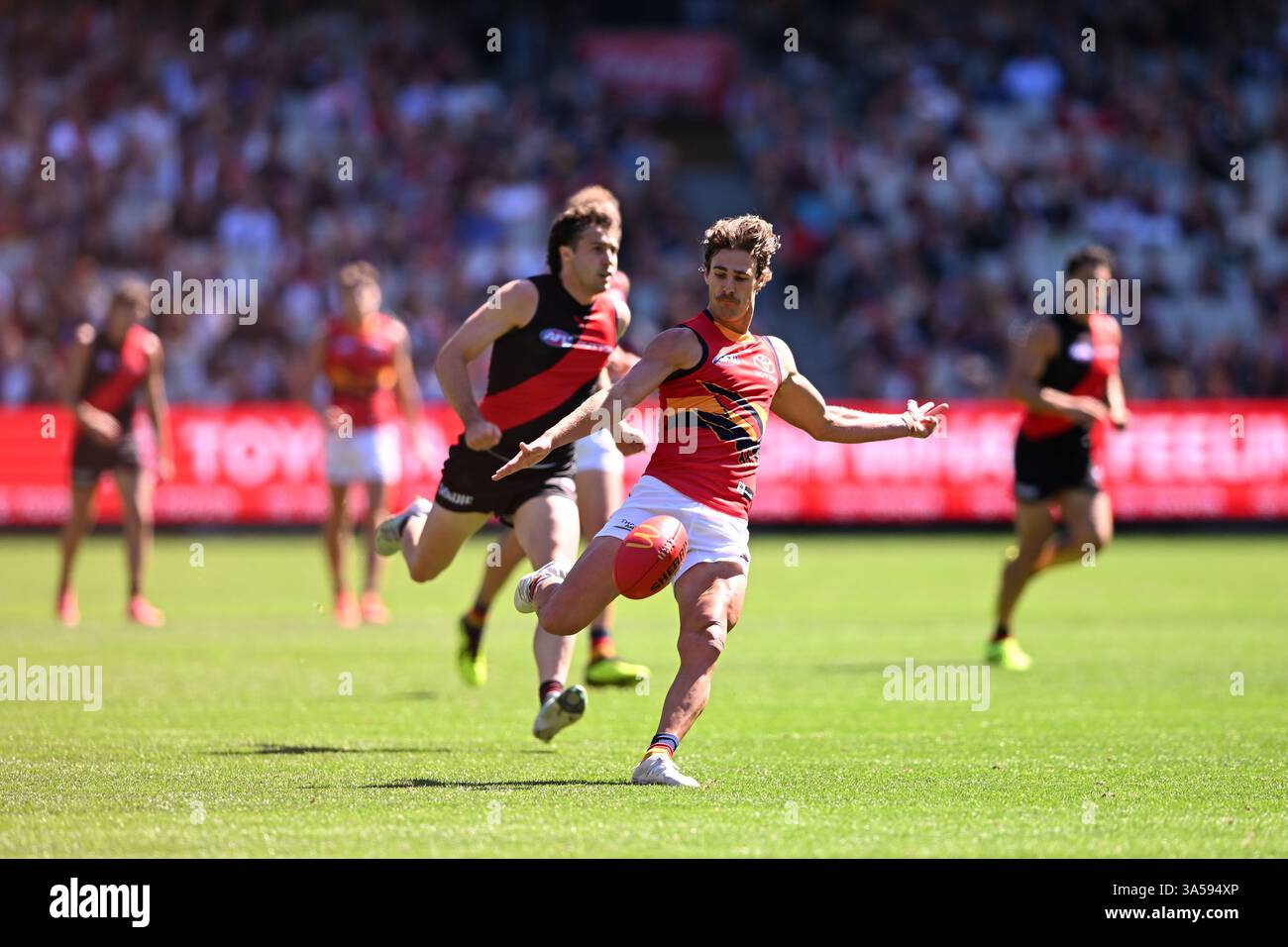 Melbourne, Australia. 22nd Mar, 2025. James Peatling of the Crows kicks ...
