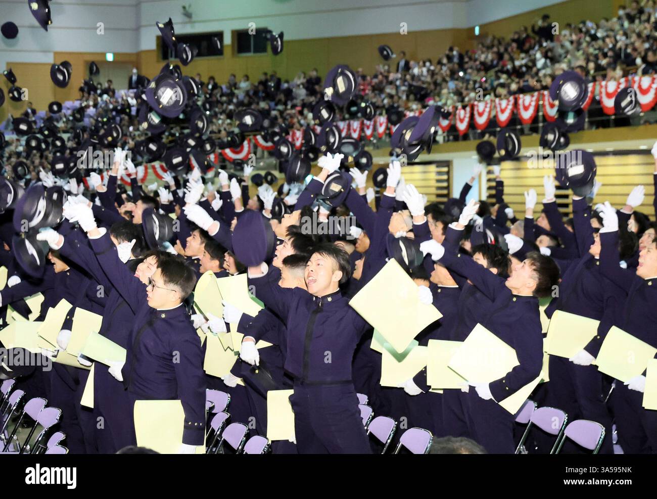 Student throw their hats the end of their graduation ceremony at the ...