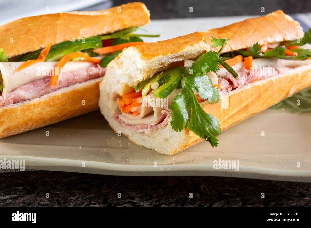 A closeup view of a ham and pate banh mi Vietnamese Sandwich Stock ...