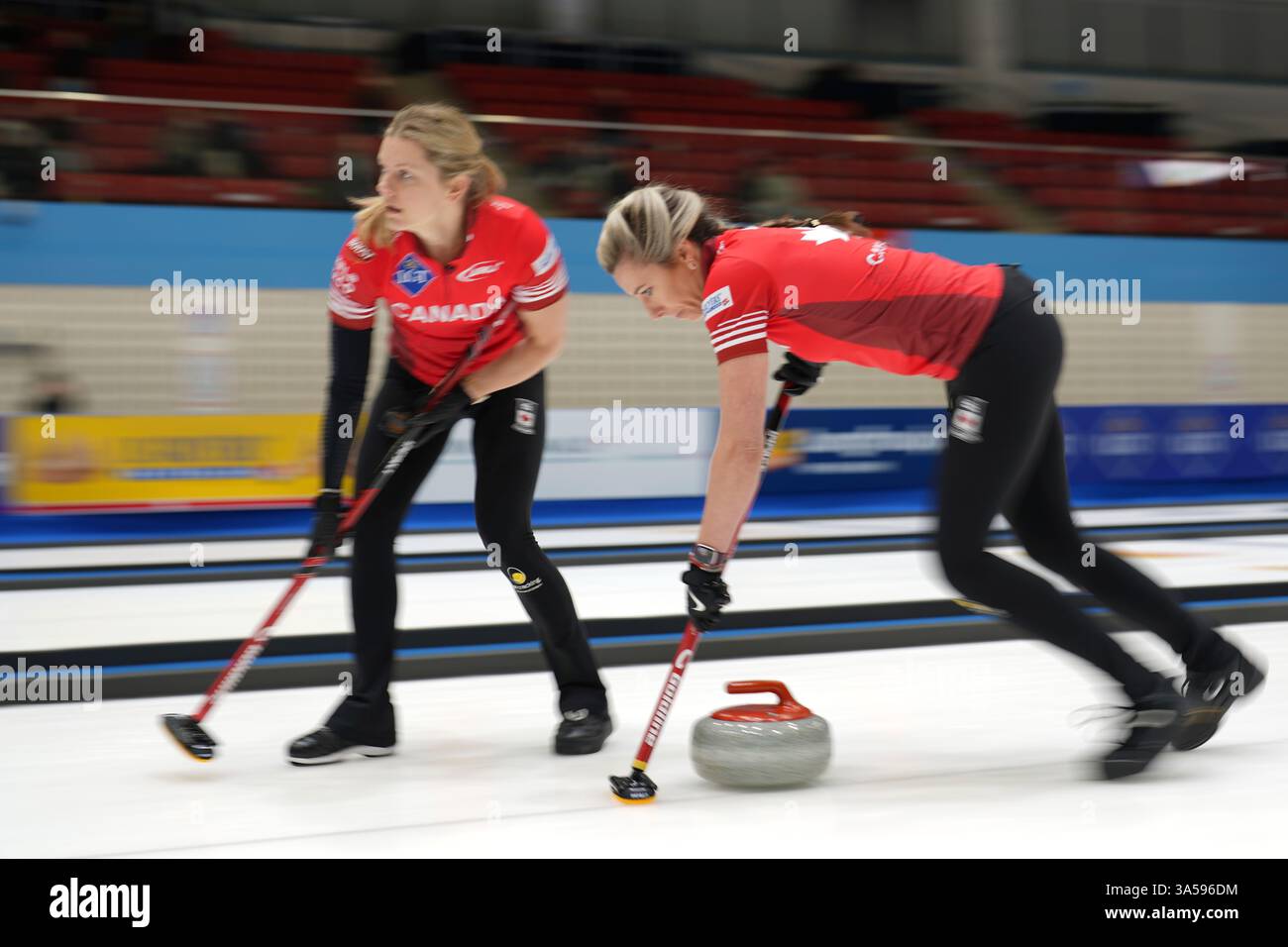Canada's Emma Miskew, right, and Sarah Wilkes, left, sweep during the ...