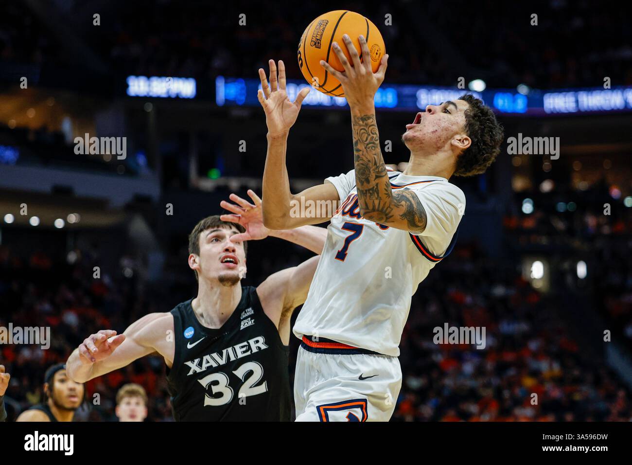 Illinois forward Will Riley (7) drives against Xavier in the first ...