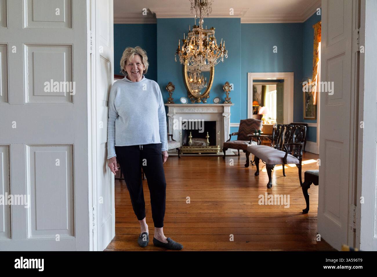 Gayle DeLashmutt poses for a portrait in the east parlor of the main ...