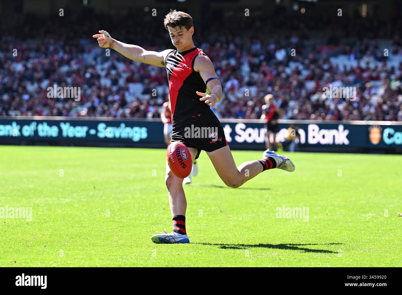 Melbourne, Australia. 22nd Mar, 2025. Jason Prior of Essendon kicks the ...