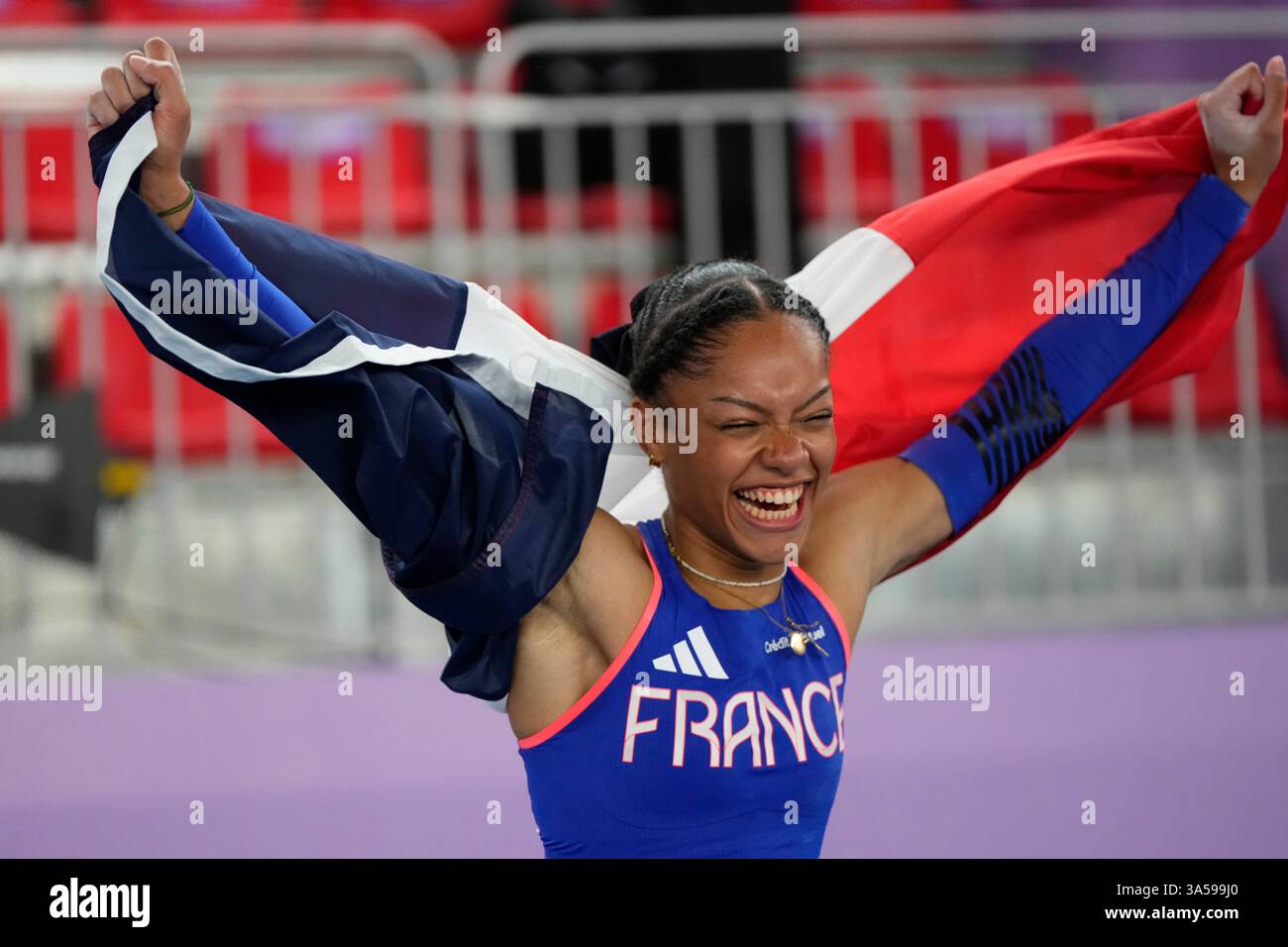 Marie-Julie Bonnin, of France, celebrates after winning gold in the ...