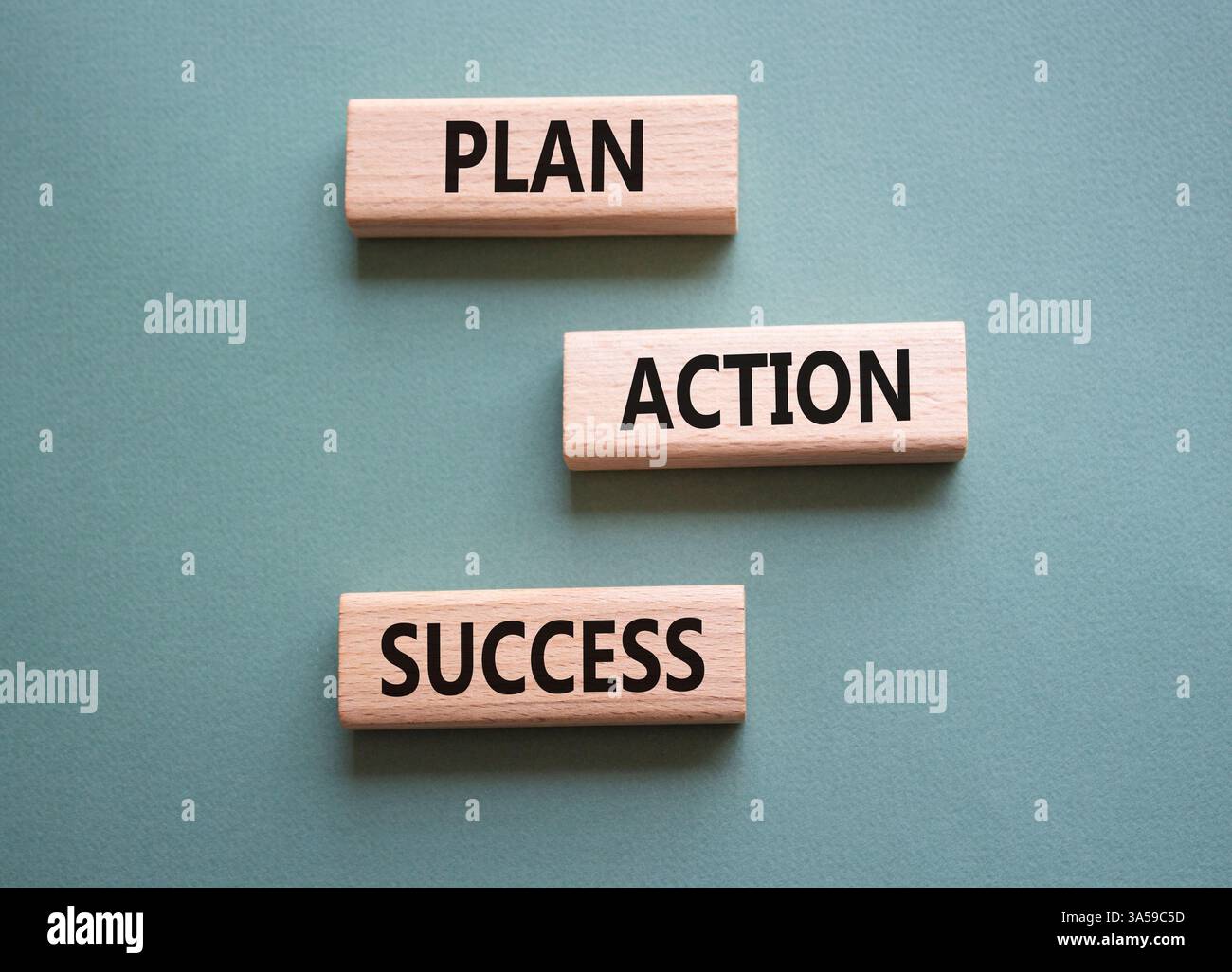 Plan Action Success symbol. Concept word Plan Action Success on wooden blocks. Beautiful grey ...