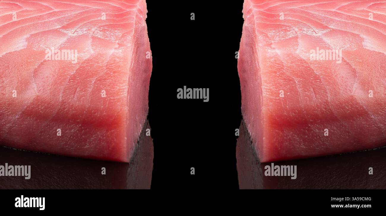 Yellow fin tuna steak isolated on black background. Fresh rare tuna ...