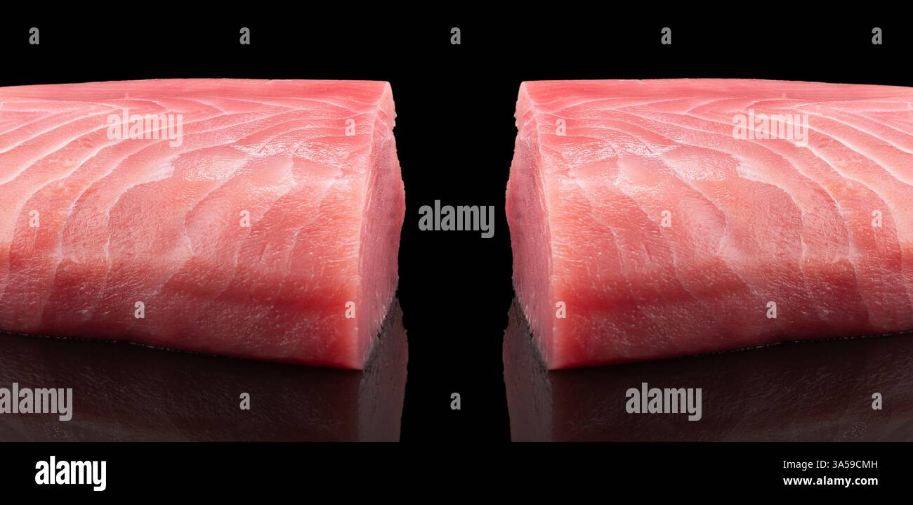 Yellow fin tuna steak isolated on black background. Fresh rare tuna ...
