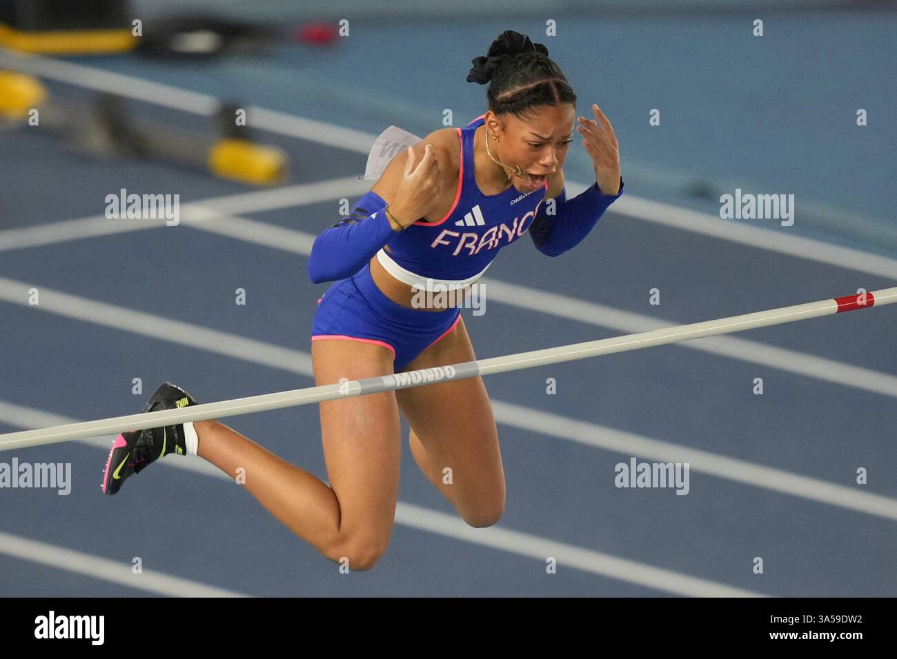 Marie-Julie Bonnin, of France, celebrates as she competes in the women ...