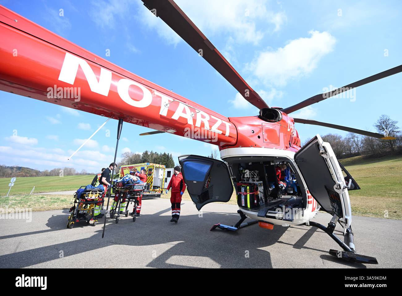 Wangen, Germany. 17th Mar, 2025. A German Air Rescue helicopter stands ...