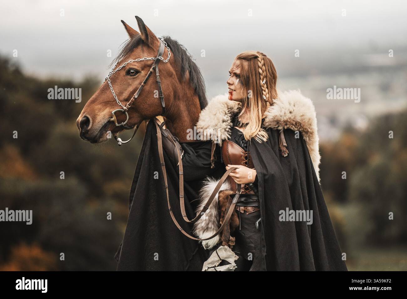 Viking woman and German Riding Pony Stock Photo - Alamy
