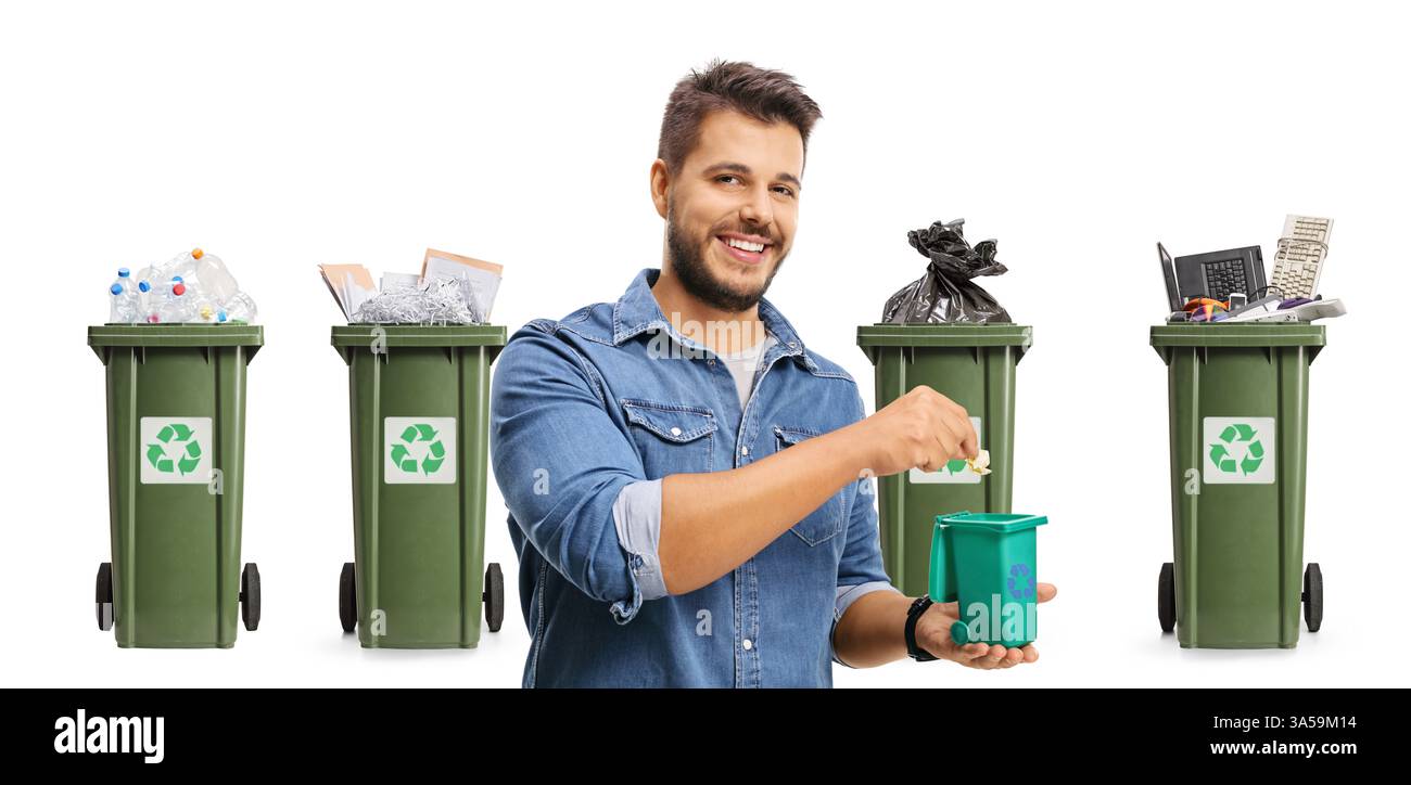Young man with many recycling bins isolated on white background Stock ...
