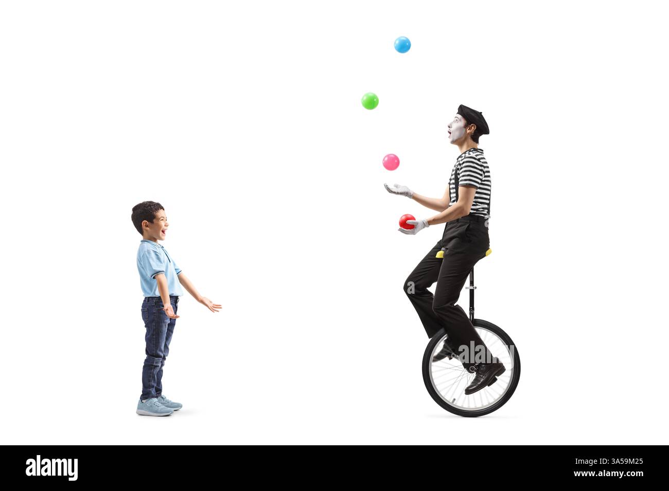 Asian boy watching a mime juggling isolated on white background Stock ...
