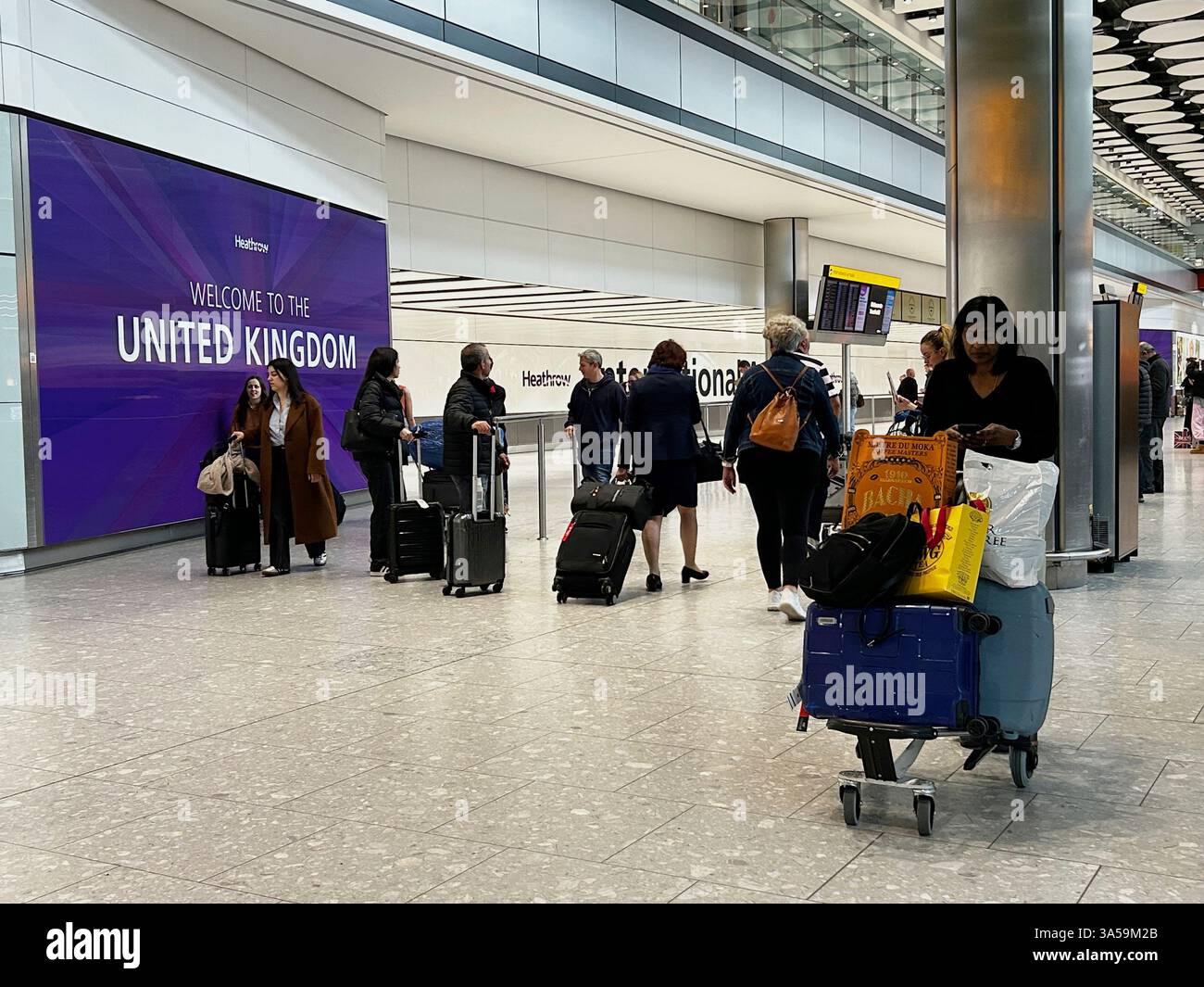 Travellers arrive at Terminal 5 as Heathrow Airport slowly resumes ...