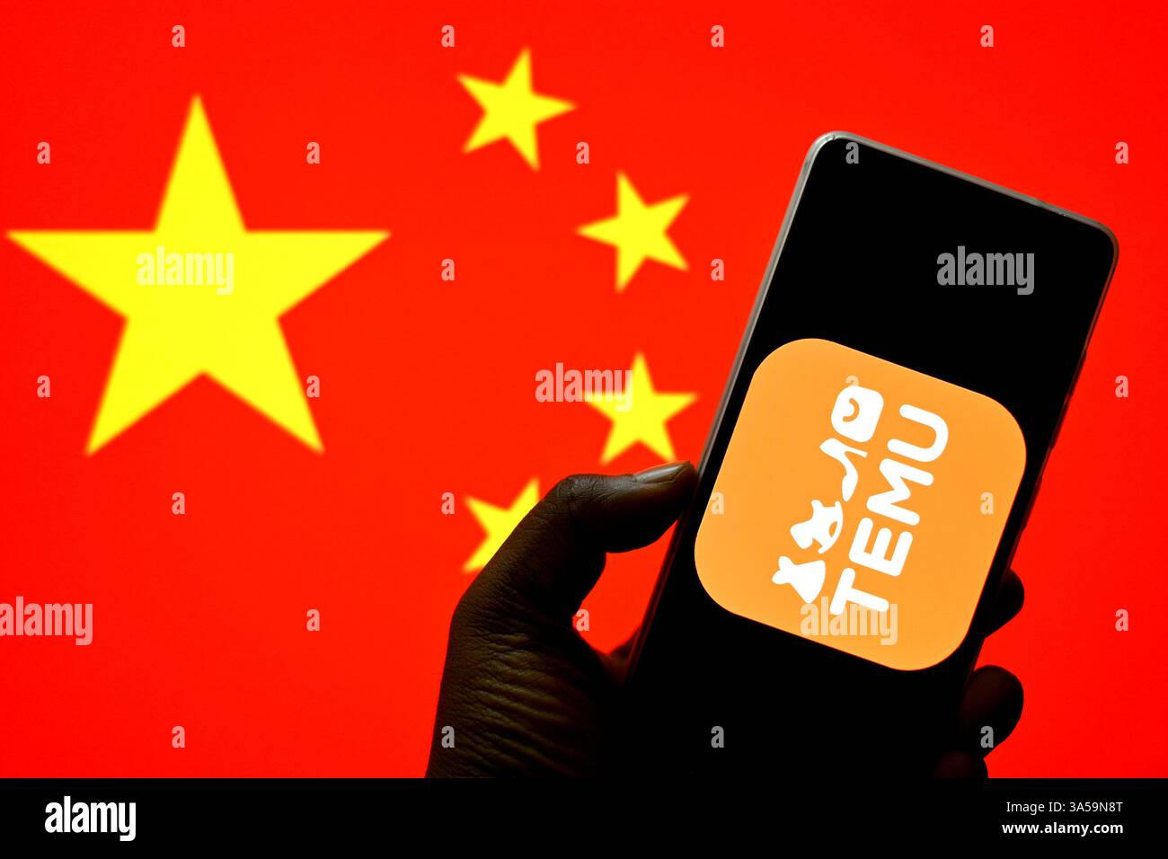 In this photo illustration, a Temu logo is seen displayed on a ...