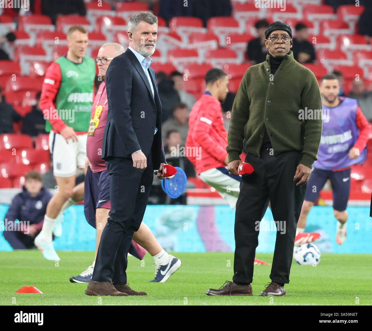 London, UK. 21st Mar, 2025. L-R Roy Keane TV pundit with Ian Wright TV ...