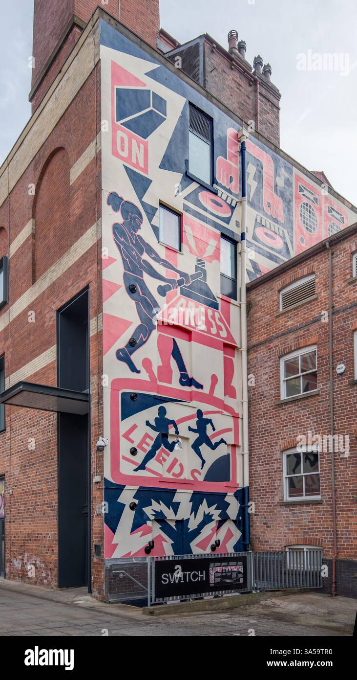 The Electric Press building in Leeds with public art mural. A ...