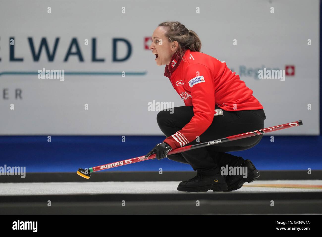 Canada's skip Rachel Homan shouts instructions to teammates during the ...