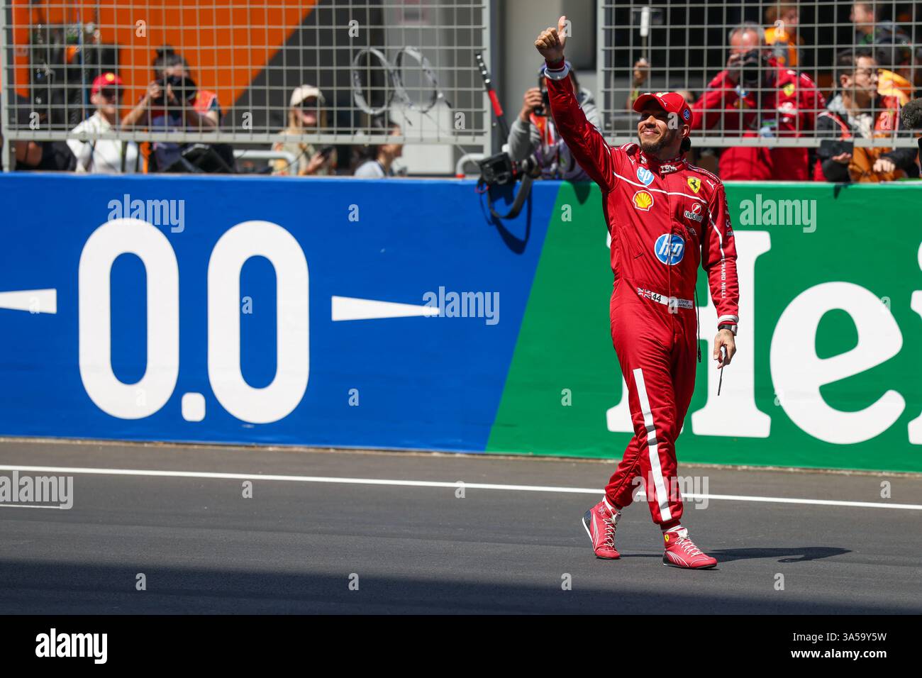 LEWIS HAMILTON (GBR) of Scuderia Ferrari #44 waving at the crowd during ...