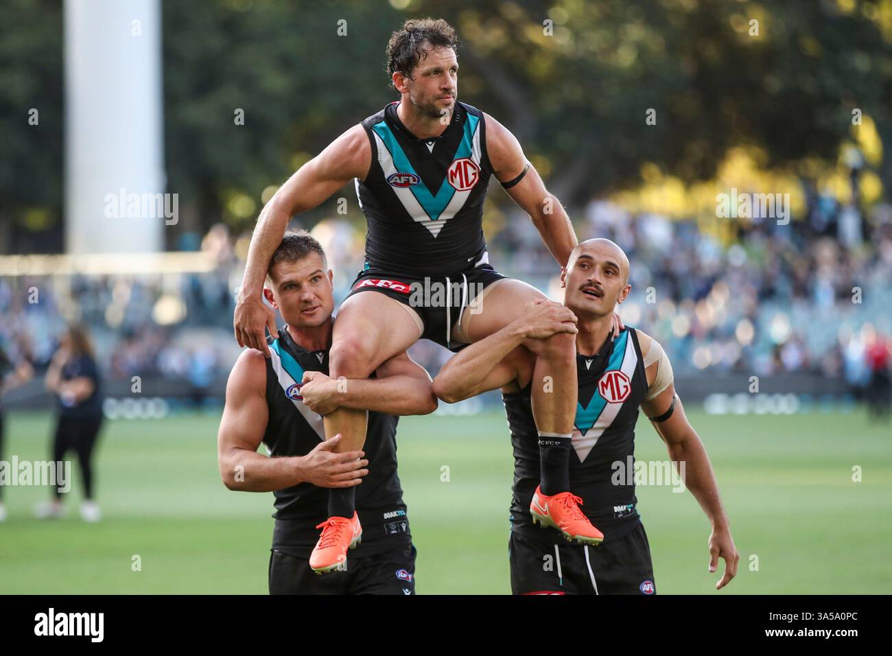 Adelaide, Australia. 22nd Mar, 2025. Travis Boak of the Power chaired ...